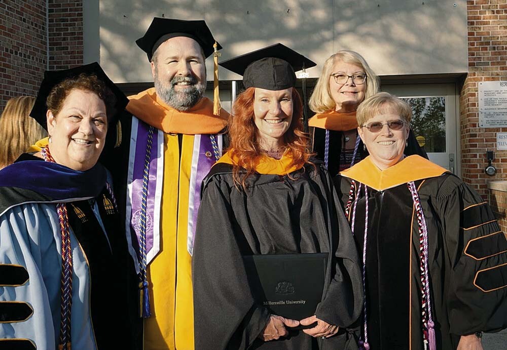 Grambau receives degree, award | TownLively